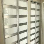 AC doors Bi-fold Custom made with White Glass Air Conditioning Doors