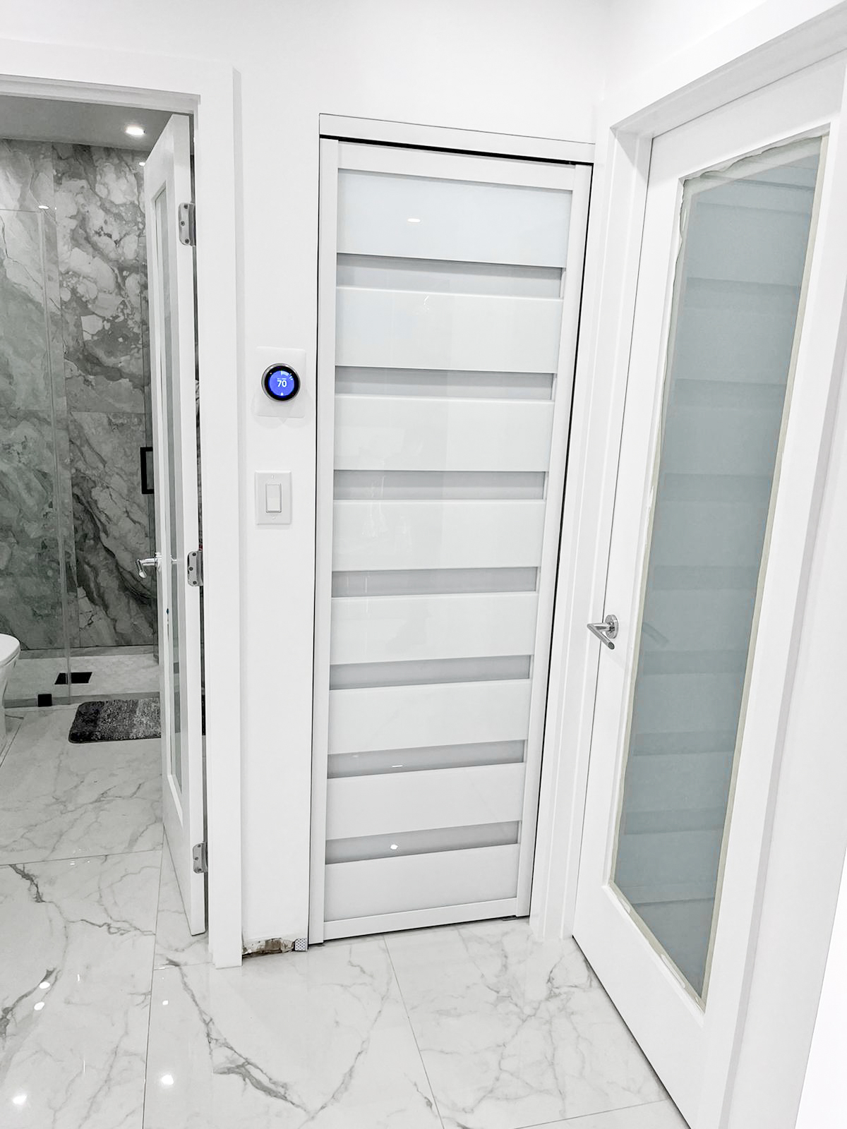 AC doors Bi-fold Custom made with White Glass Air Conditioning Doors