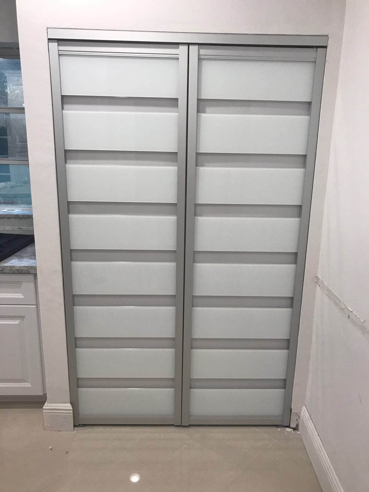 AC doors Bi-fold Custom made with White Glass Air Conditioning Doors